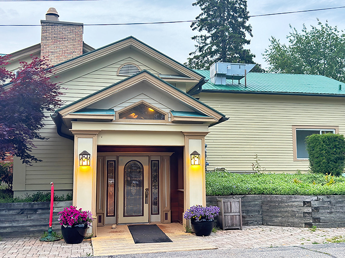 The welcoming facade of The Grill House stands like a culinary lighthouse in Allegan, beckoning hungry travelers with its classic charm and promise of carnivorous delights.