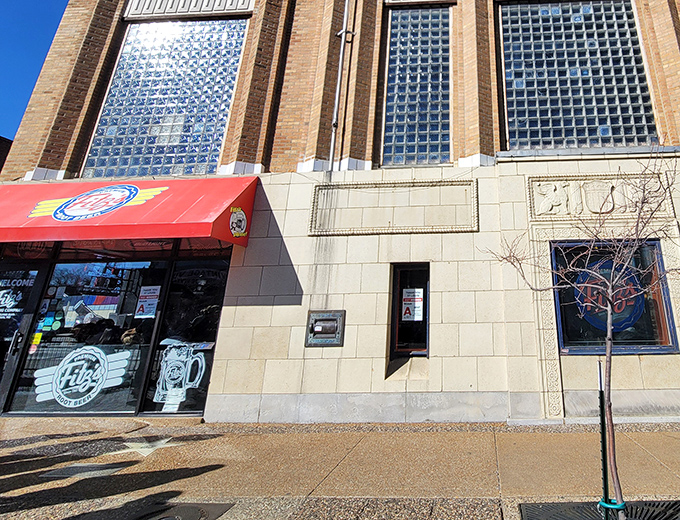 The blue brick fortress of fizz! Fitz's exterior mural tells the story of St. Louis in vibrant colors, with the iconic logo shining like a carbonated sun.