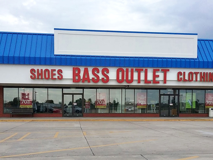The iconic blue roof of Sikeston Factory Outlet Stores stands like a retail oasis in Missouri, promising treasure hunts where Wrangler meets wallet-friendly.