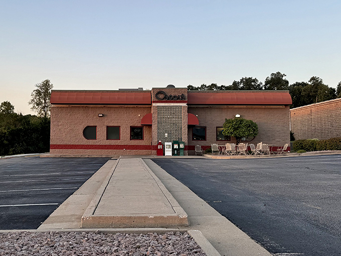 The copper-topped awning of Oscar's Classic Diner beckons like a beacon of comfort food salvation amid Jefferson City's bustling streets. 