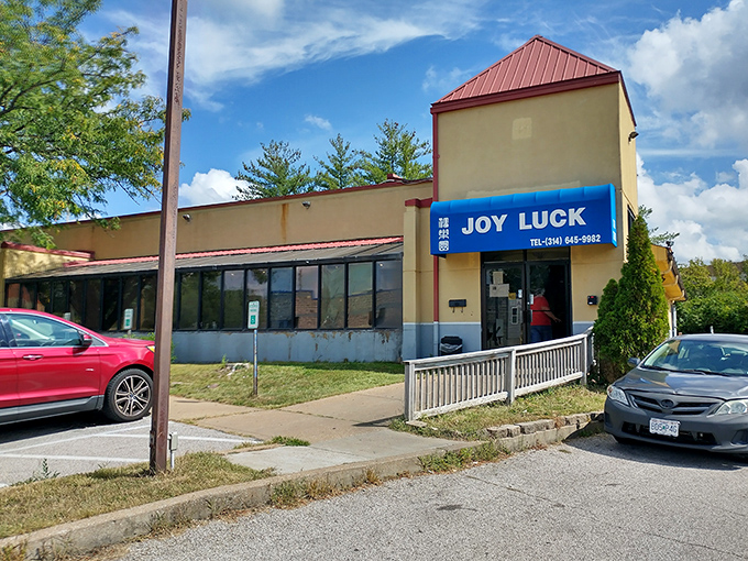 The unassuming blue sign beckons like a culinary lighthouse, promising treasures within that far exceed the modest exterior's promises.