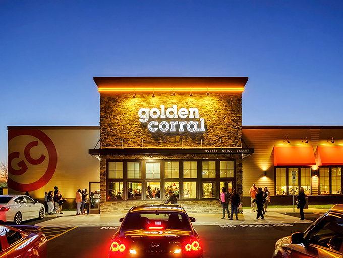 The golden glow of possibility! As dusk settles, this O'Fallon landmark beckons hungry travelers with promises of unlimited culinary adventures inside.