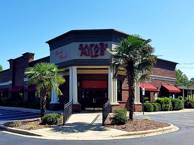 Safari Miles welcomes hungry travelers with its stately brick façade and classic columns, like a culinary embassy where your passport to prime rib awaits.
