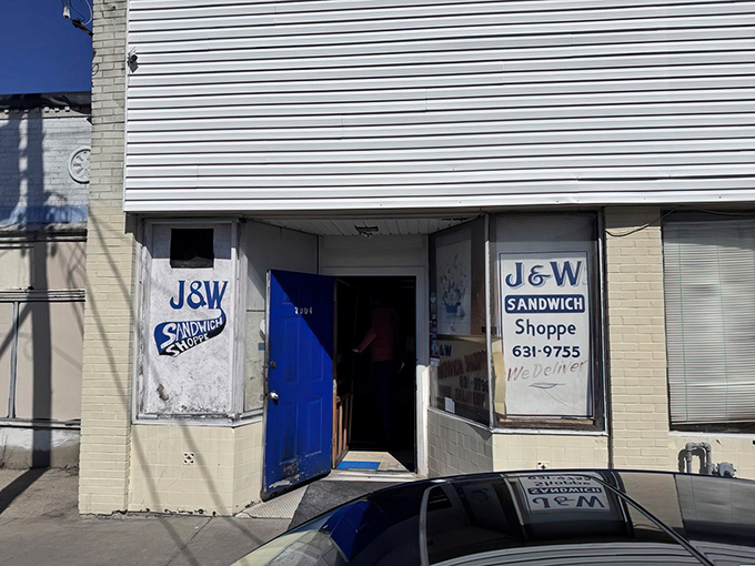 The blue door to sandwich paradise isn't flashy, but like all great culinary adventures, the unassuming entrance hides extraordinary delights within.