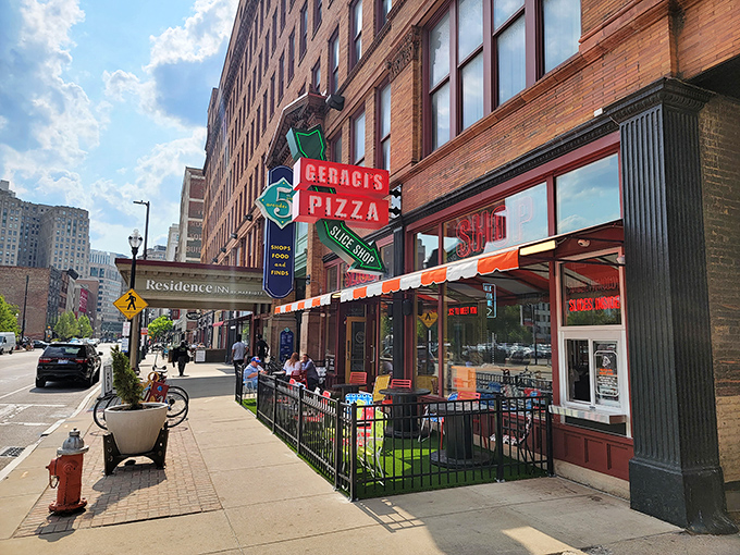 The iconic red and green Geraci's sign beckons pizza pilgrims like a lighthouse for the cheese-obsessed. Downtown Cleveland never smelled so good.