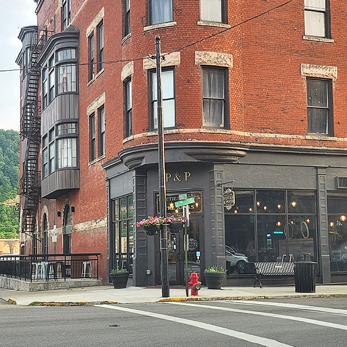 Historic charm meets modern flavor at this corner brick building in downtown Portsmouth. The curved architecture whispers stories of Ohio's past while promising delicious adventures inside.