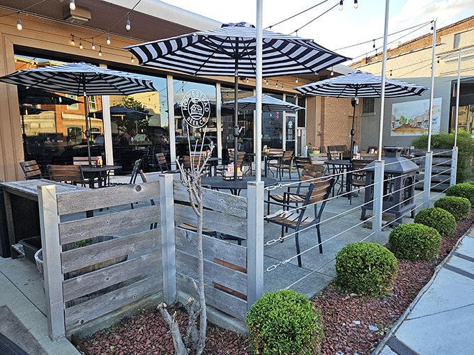The patio at Homestead beckons with its striped umbrellas and string lights&mdash;a perfect spot for summer evenings when Ohio decides to behave weather-wise. 