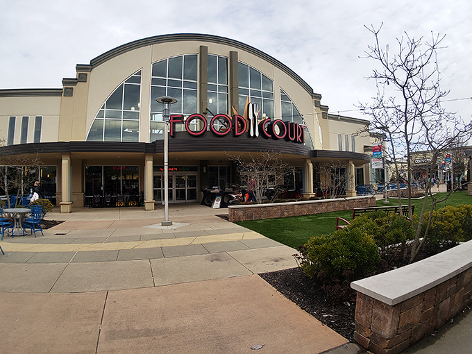 The grand entrance to Cincinnati Premium Outlets beckons like a temple of retail therapy, promising treasures within those won't bankrupt your retirement fund.