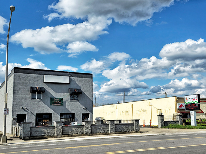 The unassuming exterior of Josie's Pizza stands like a culinary sentinel on West Broad Street, promising authentic flavors without the fancy frills.
