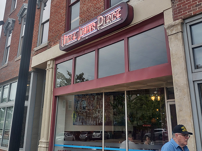 The neon sign of Uncle John's Place glows like a beacon for hungry travelers. This unassuming brick storefront in Mansfield has been serving comfort food since 1972. 