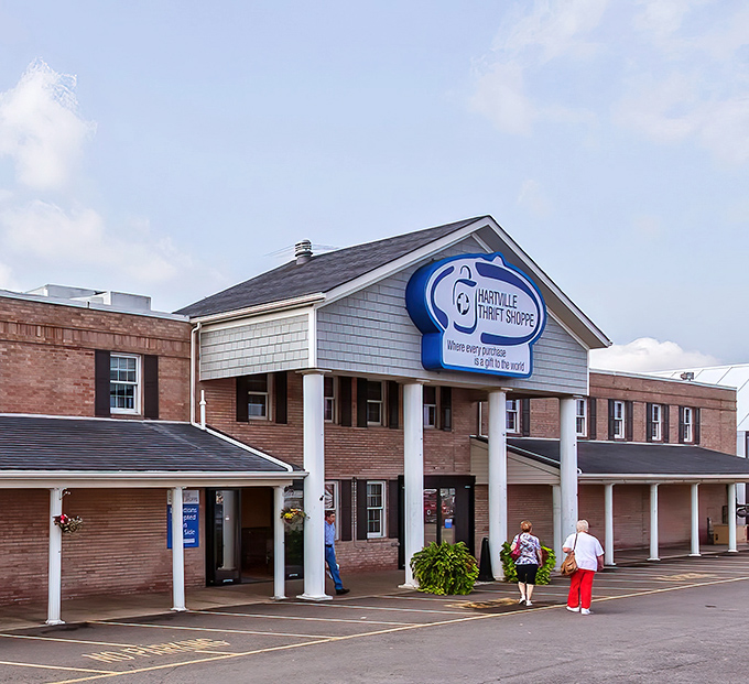 The colonial-style facade of Hartville Thrift Shoppe stands like a temple to second chances, where bargain hunters make their pilgrimage for retail redemption.