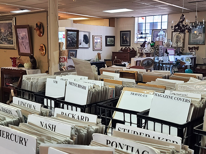 A treasure hunter's paradise! Organized chaos of vintage magazine covers and automotive memorabilia awaits discovery in this corner of Columbus's time capsule.