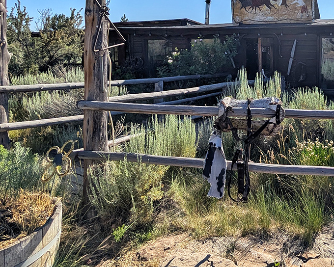 The rustic exterior of Cowboy Dinner Tree stands defiant against the high desert, like a time capsule of the Old West waiting to welcome hungry travelers.