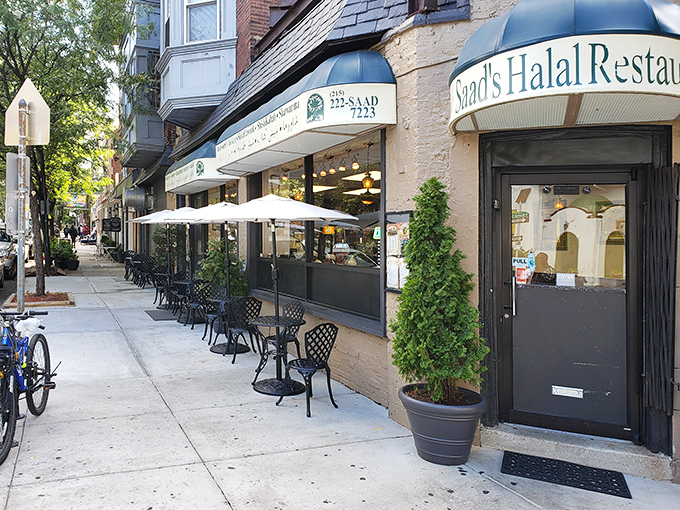 The unassuming storefront of Saad's Halal Restaurant, where culinary magic happens without the flash and dazzle of tourist traps.