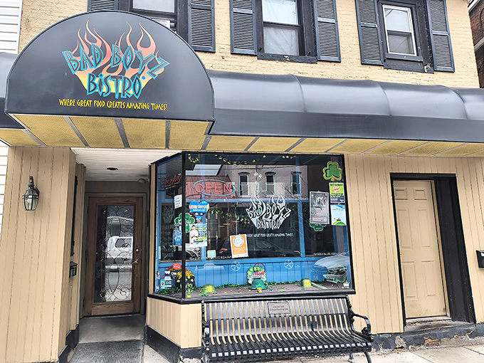 The unassuming exterior of Bad Boyz Bistro in Bedford hides culinary treasures within. That flame-adorned sign isn't just for show&mdash;it's a warning for your taste buds.