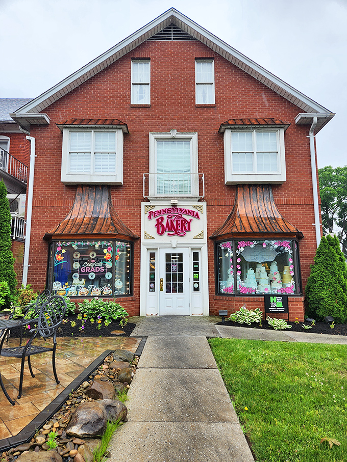 The charming brick exterior of The Pennsylvania Bakery beckons with its distinctive copper awnings and colorful window displays&mdash;like a sweet-tooth siren call to dessert lovers.