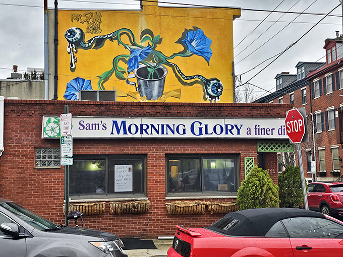 The sunshine-yellow mural above Morning Glory Diner isn't just decoration—it's a beacon calling breakfast lovers home to this South Philly institution.