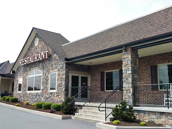 The stone facade of Dutch-Way welcomes hungry travelers like a culinary lighthouse guiding you to comfort food harbor.