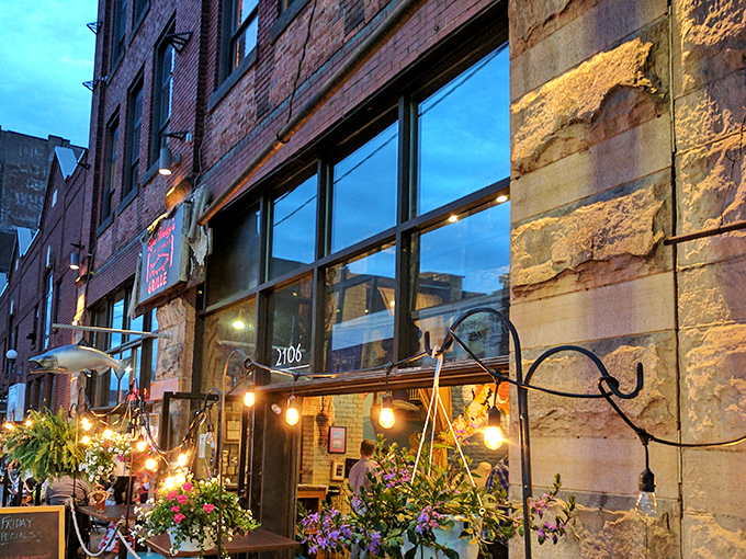 The iconic blue awning of Luke Wholey's beckons seafood lovers like a lighthouse calling ships to shore. String lights add a touch of whimsy to this Pittsburgh gem.