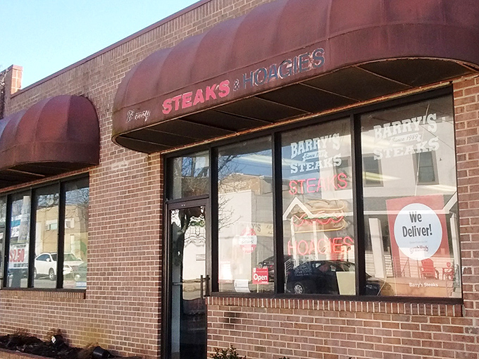 The brick-and-mortar temple of cheesesteak worship, where the modest exterior belies the culinary treasures within. No fancy frills needed when the food speaks this loudly.