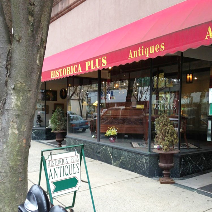 The iconic red awning of Historica Plus beckons like a time portal on Clearfield's main street, promising treasures within.