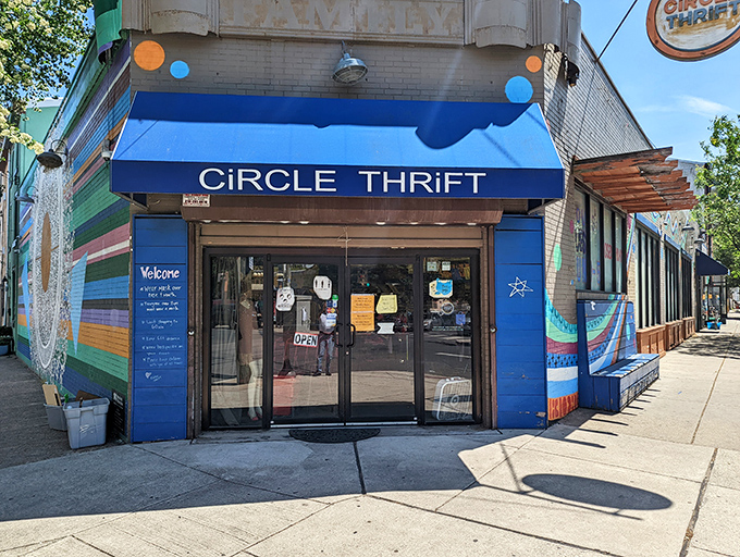 The iconic blue awning of Circle Thrift stands out like a beacon of bargain hope on Philadelphia's urban landscape. Treasure hunters, your destination awaits! 