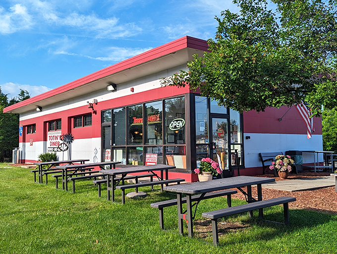 That red and white exterior might look humble, but breakfast magic happens behind those doors every single day.
