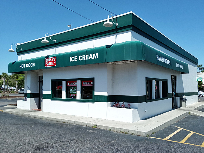 The green and white exterior of Burky's Grill stands like a beacon of hope for hungry travelers seeking honest-to-goodness comfort food in Myrtle Beach.