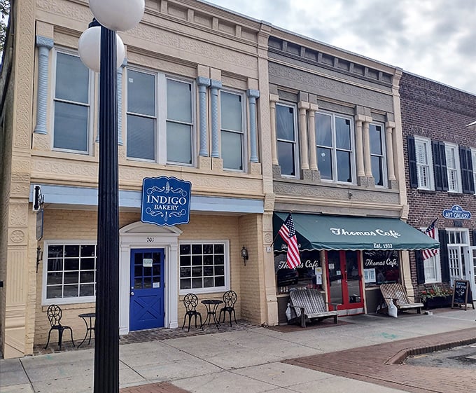 The iconic green awning of Thomas Caf&eacute; has been welcoming hungry Georgetown visitors since 1933. Small-town charm with big-time flavor awaits behind that red door.