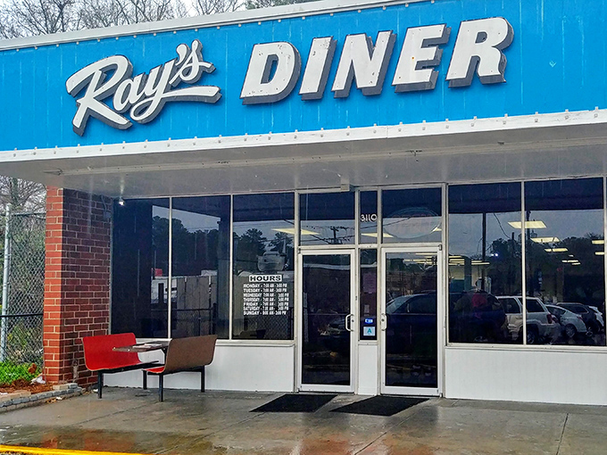 The iconic blue sign of Ray's Diner stands as a beacon of breakfast hope on Two Notch Road, promising comfort food that transcends trendy culinary fads.