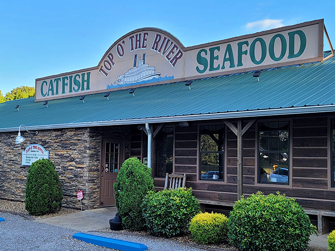The rustic charm of Top O' The River beckons hungry travelers like a siren song for catfish enthusiasts. No fancy frills needed when the food speaks this loudly.