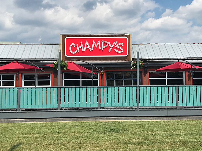 That iconic red Champy's sign against the teal fence isn't just eye-catching&mdash;it's a beacon calling to hungry souls across Murfreesboro.