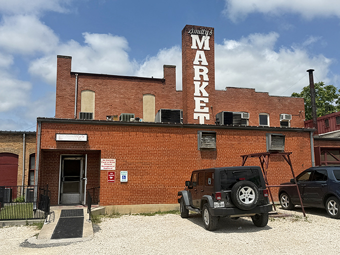 That weathered brick facade might fool you, but behind those walls lies barbecue gold.