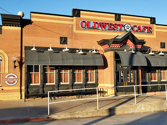 The brick facade of Oldwest Cafe stands like a culinary fortress in Denton, promising hearty breakfasts without pretension or apology.