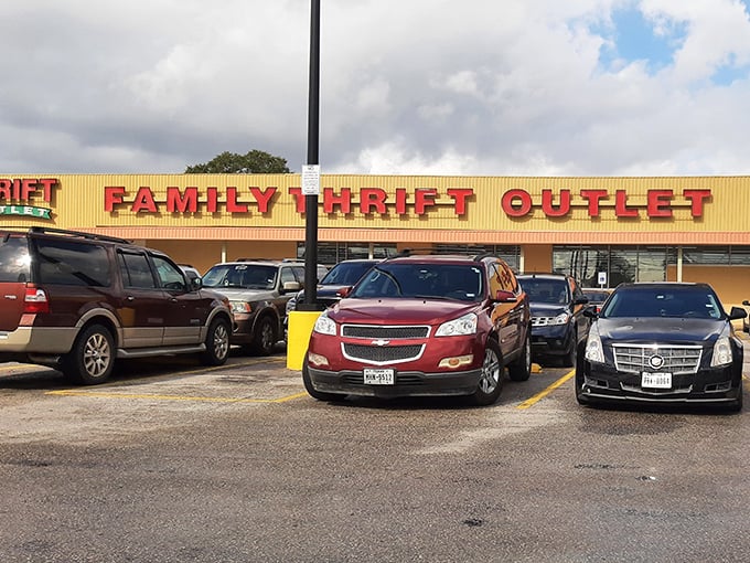 The bright yellow exterior of Family Thrift Center Outlet stands like a beacon of bargain possibilities on Little York Road in Houston.