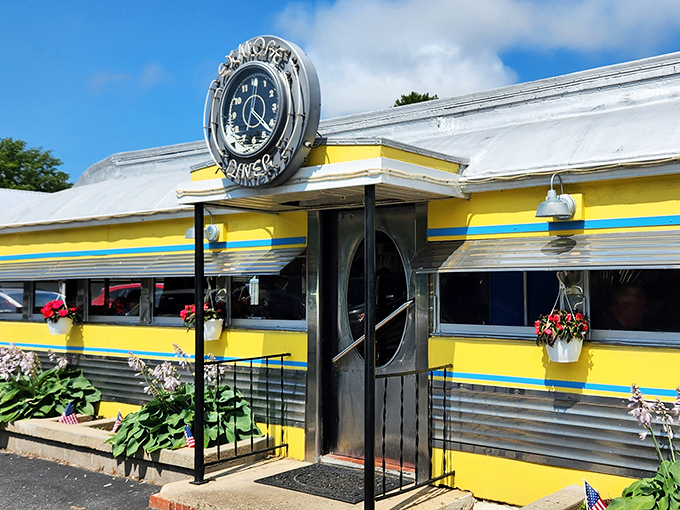 The gleaming stainless steel and sunny yellow exterior isn't just a diner&mdash;it's a time machine with a side of hash browns.
