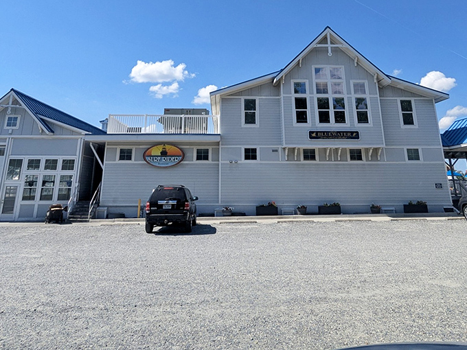 The iconic Surf Rider sign promises seafood paradise &ndash; like a coastal lighthouse guiding hungry travelers home.