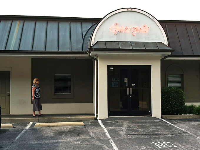 The unassuming entrance to George's Steak House stands like a culinary speakeasy &ndash; no flashy signs needed when your reputation travels by word of mouth.