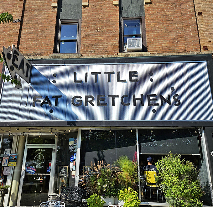 The iconic storefront beckons with its vintage charm and cheerful planters. That "EAT" sign isn't just a suggestion—it's practically a command.