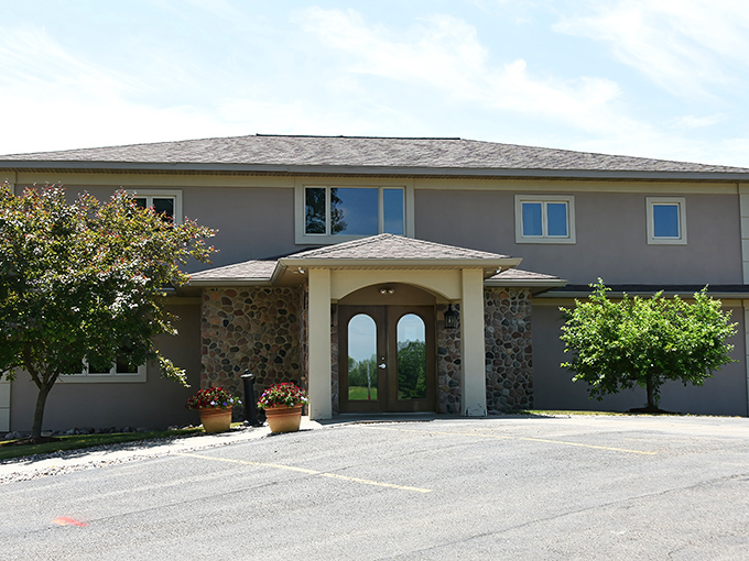 The stone-accented entrance to Cimaroli's stands like a culinary fortress, promising treasures within. Wisconsin's supper club tradition at its most inviting.