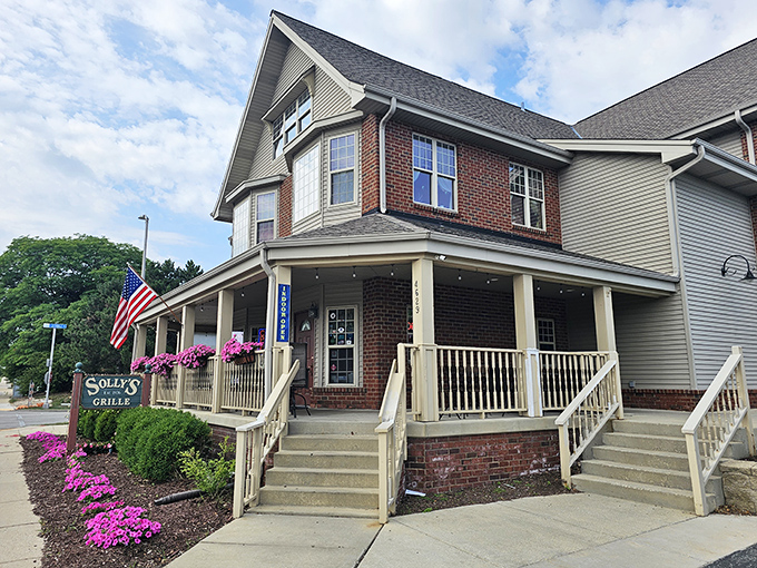 Solly's Grille stands proudly in its charming brick building, complete with a welcoming front porch that practically whispers, "Come in, loosen your belt, stay awhile."