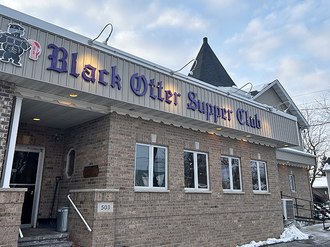 The unassuming exterior of Black Otter Supper Club stands as a beacon of Wisconsin dining tradition, promising comfort and satisfaction beyond its brick façade.