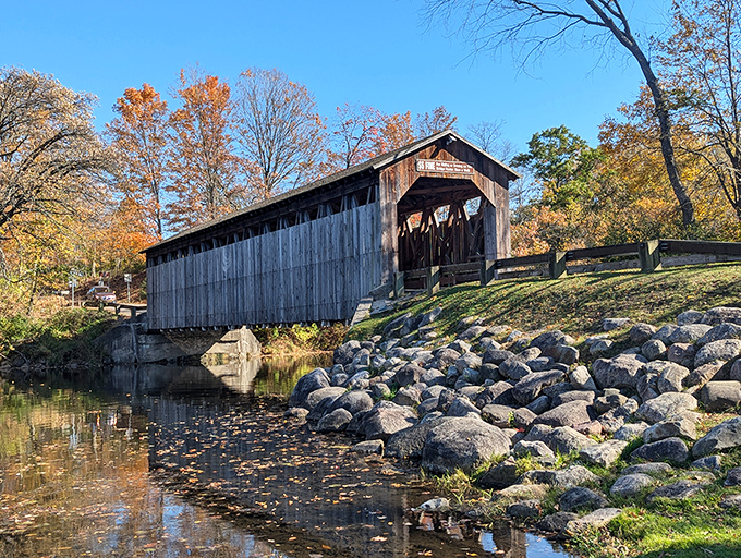 Time stands still at Fallasburg Covered Bridge, where autumn's palette creates a masterpiece worthy of a Michigan postcard. Nature and history in perfect harmony.