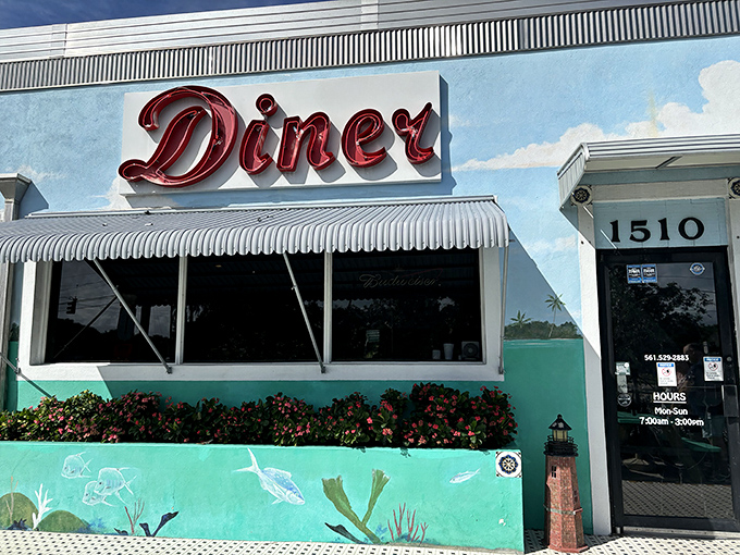 That turquoise exterior isn't just pretty &ndash; it's practically broadcasting "amazing comfort food lives here, folks!"