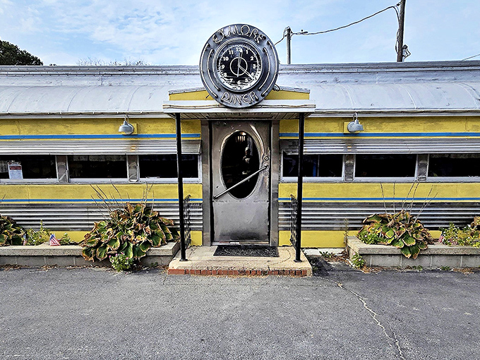 The gleaming stainless steel and sunny yellow exterior isn't just a diner&mdash;it's a time machine with a side of hash browns.