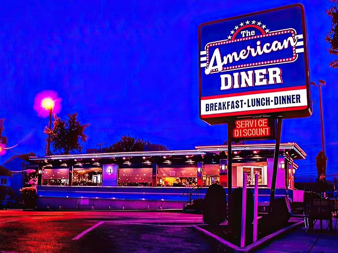 The classic stainless steel exterior with vibrant stripes promises comfort food nirvana before you even step inside.