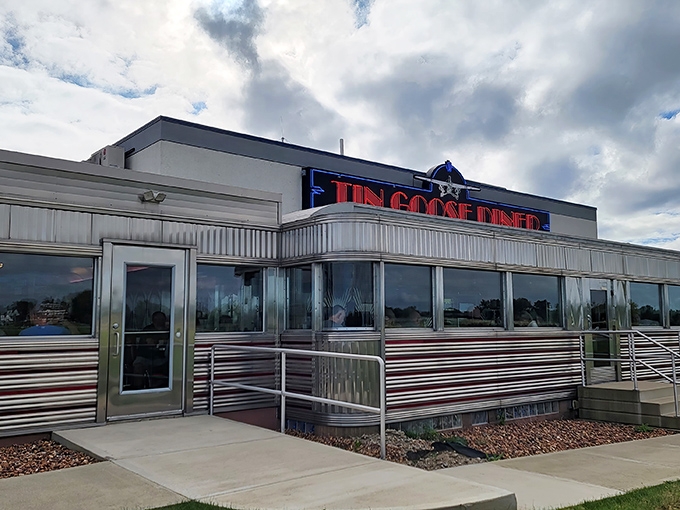 The gleaming stainless steel exterior of Tin Goose Diner shines like a beacon of hope for hungry travelers. Time travel never looked so appetizing.
