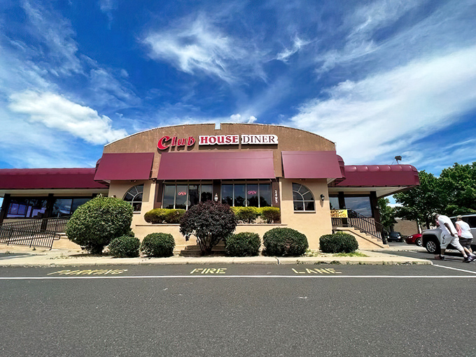 The iconic Club House Diner sign stands tall against the Pennsylvania sky, while a vintage car seems to have time-traveled just for breakfast.