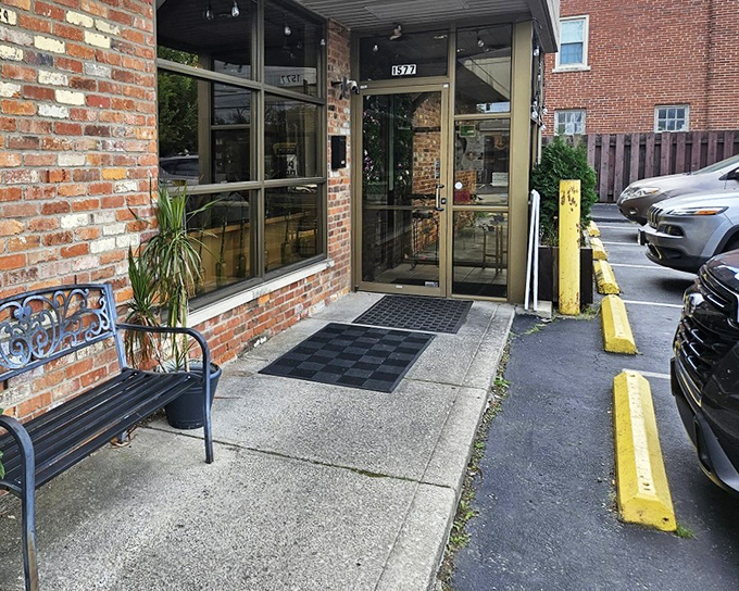 Unassuming brick exterior that proves the old adage true: never judge a restaurant by its storefront. Filipino culinary magic awaits inside.