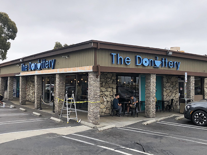 The stone-accented exterior of The Donuttery beckons like a siren song to donut lovers across Huntington Beach.